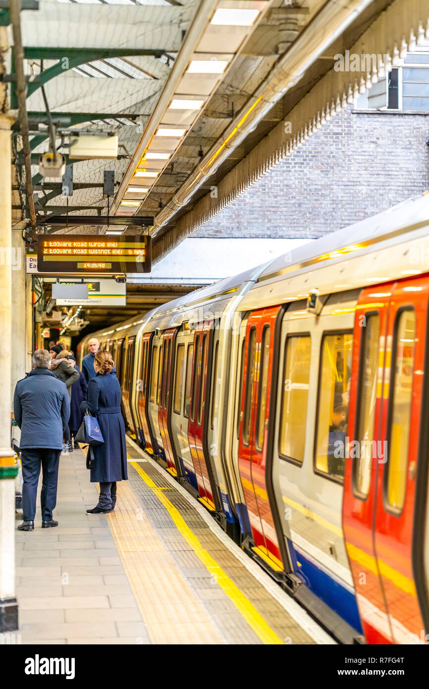 London underground train and platform at an "open" above ground station ...