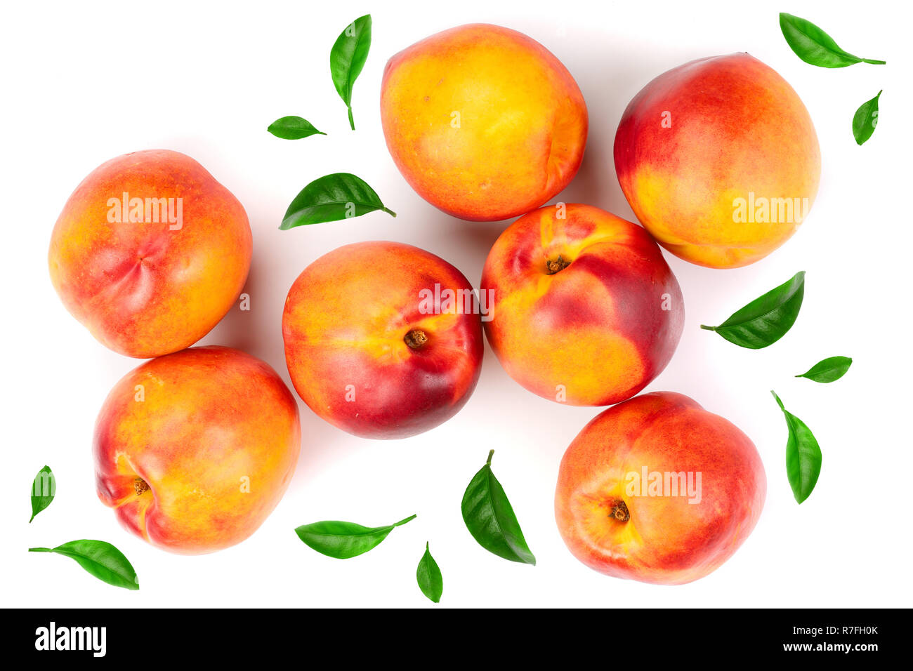 ripe nectarine with leaves isolated on white background. Top view. Flat ...