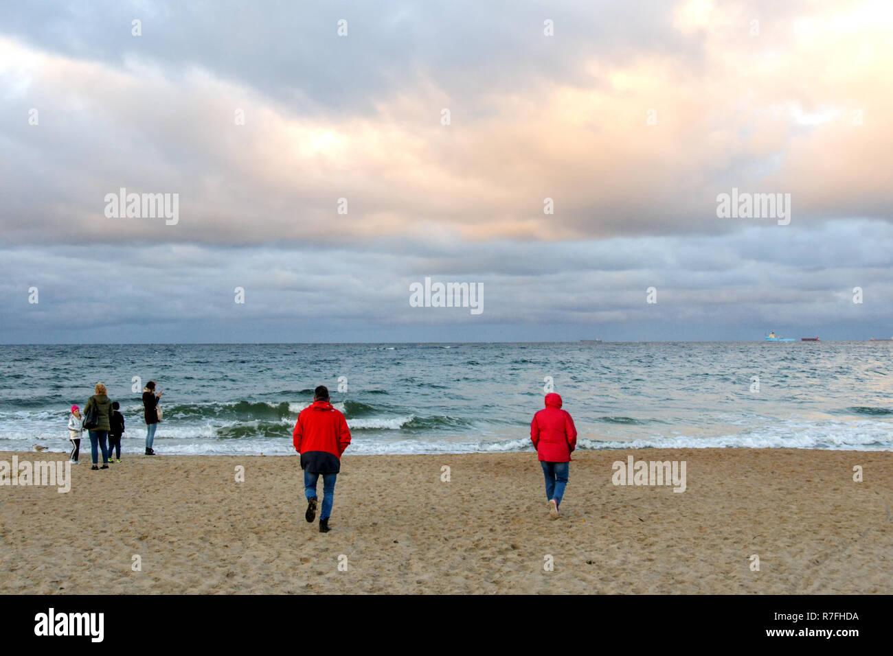 Walking on the seashore, by the sea Stock Photo - Alamy
