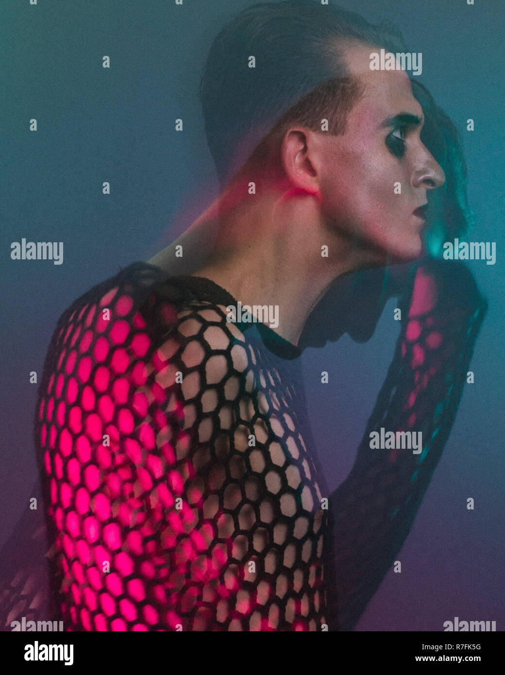 Double exposure of crazy man with mesh top, smokey eyes and smoke Stock ...