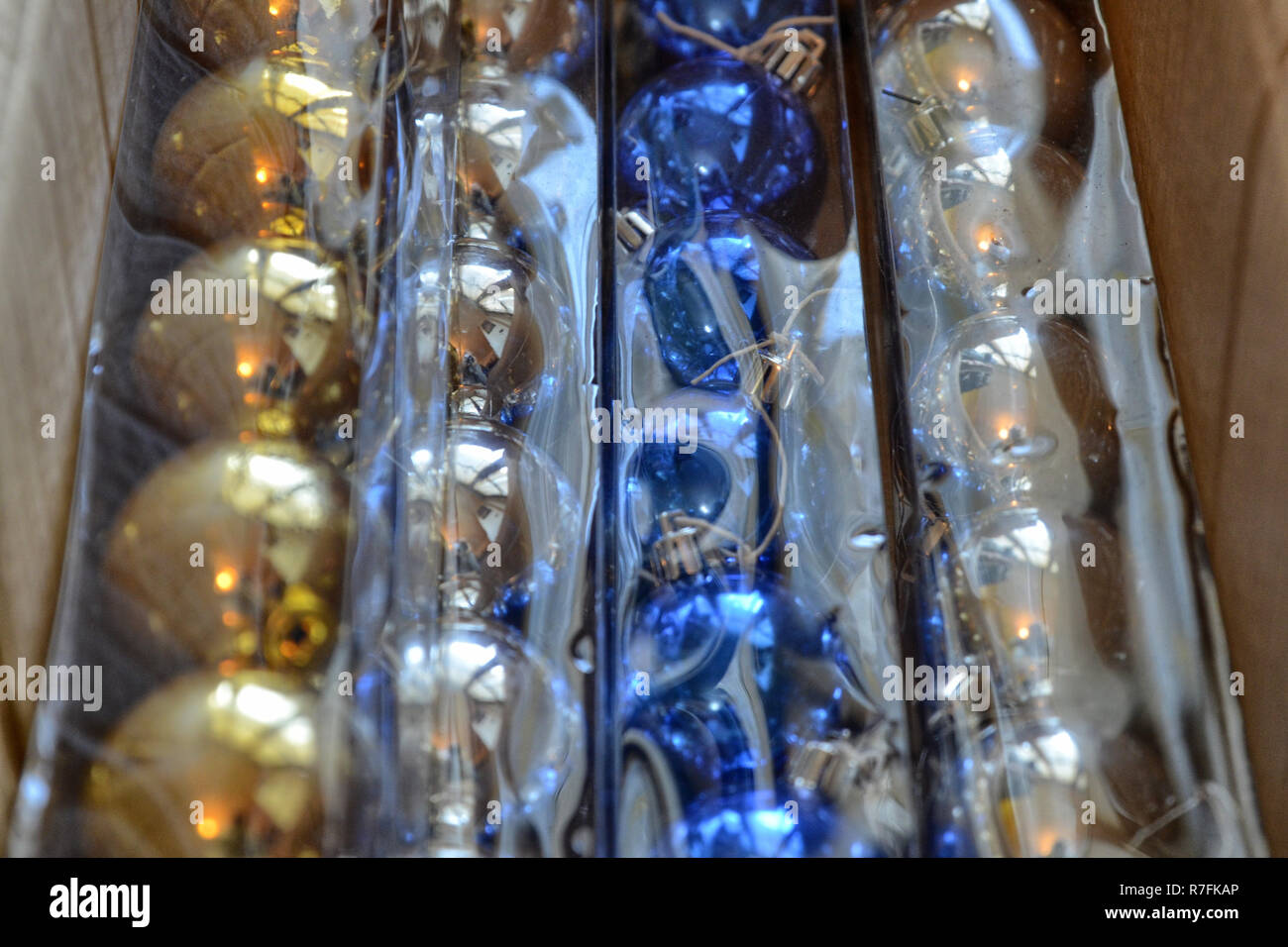 Preparation of the Christmas tree: boxes packed with Christmas balls ...