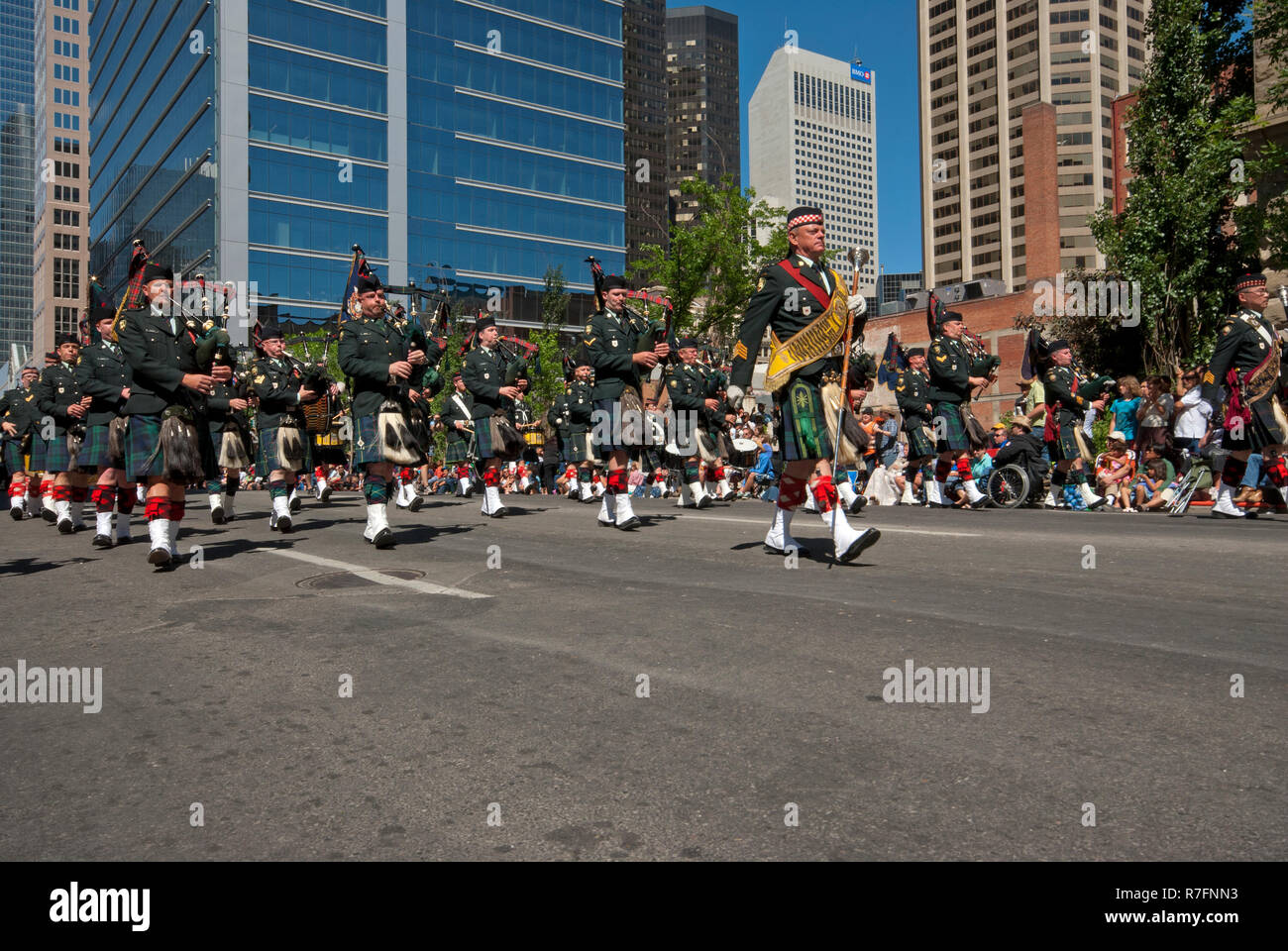 Scottish band in traditional dresses (kilts) during the Calgary ...