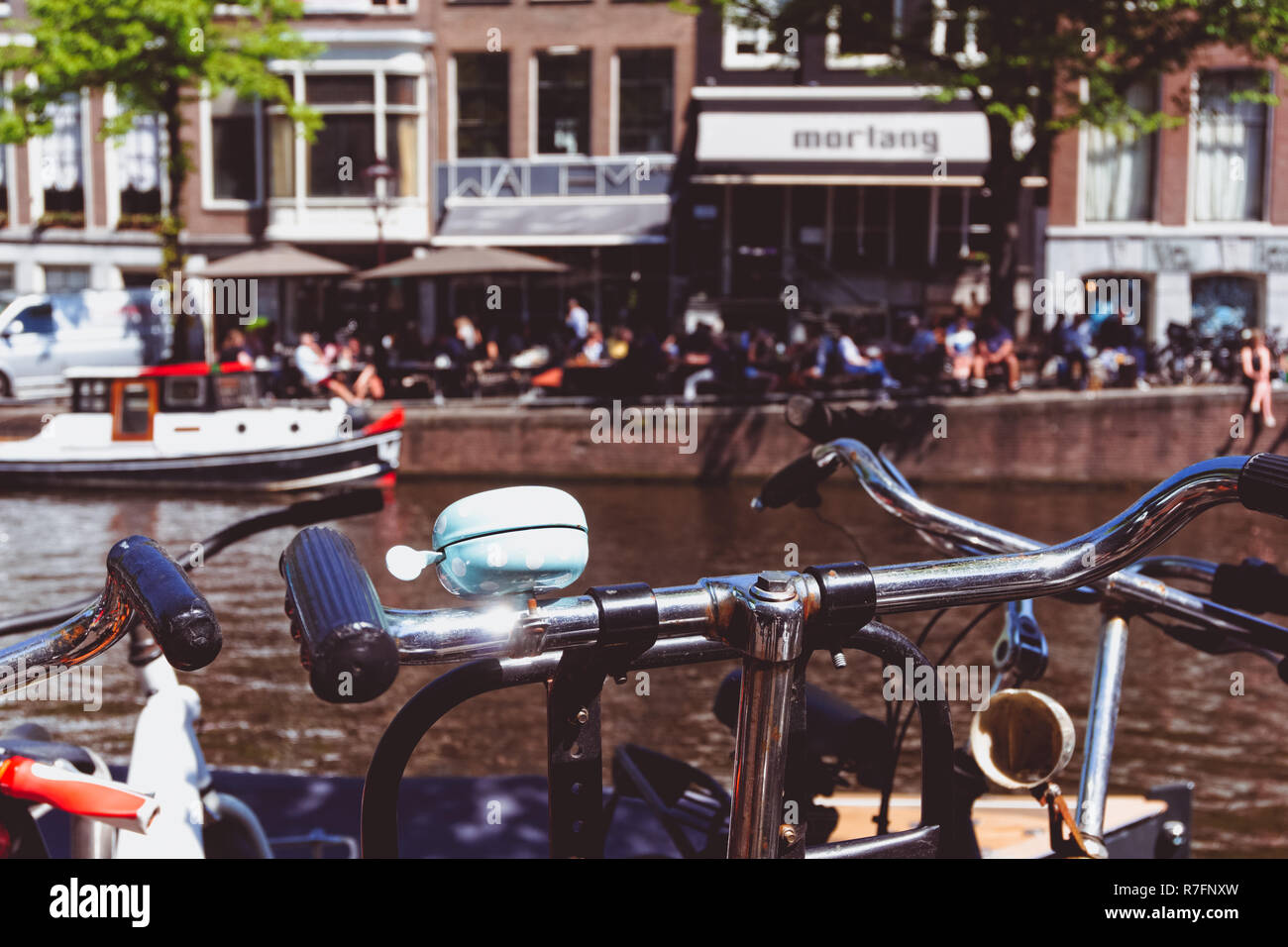 Traditional Dutch bikes parked on Keizersgracht canal in Amsterdam ...
