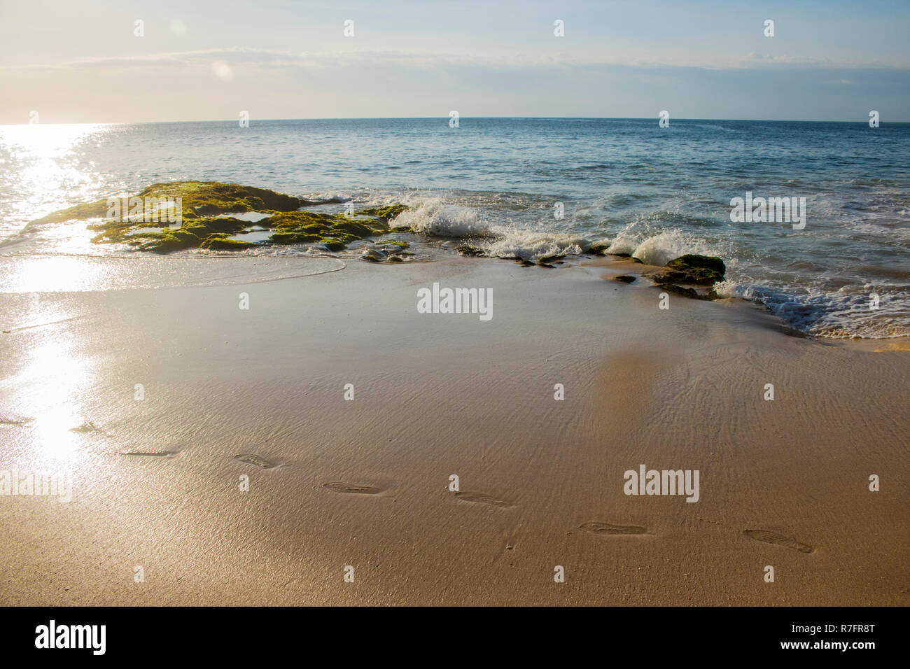 footprints on beach sand summer holiday theme Stock Photo - Alamy