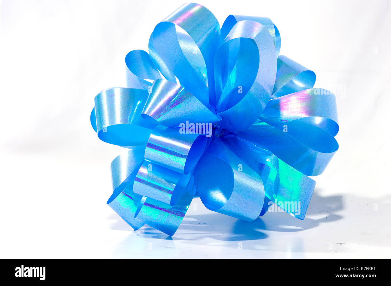 big round bow in blue color isolated on white background close up Stock ...