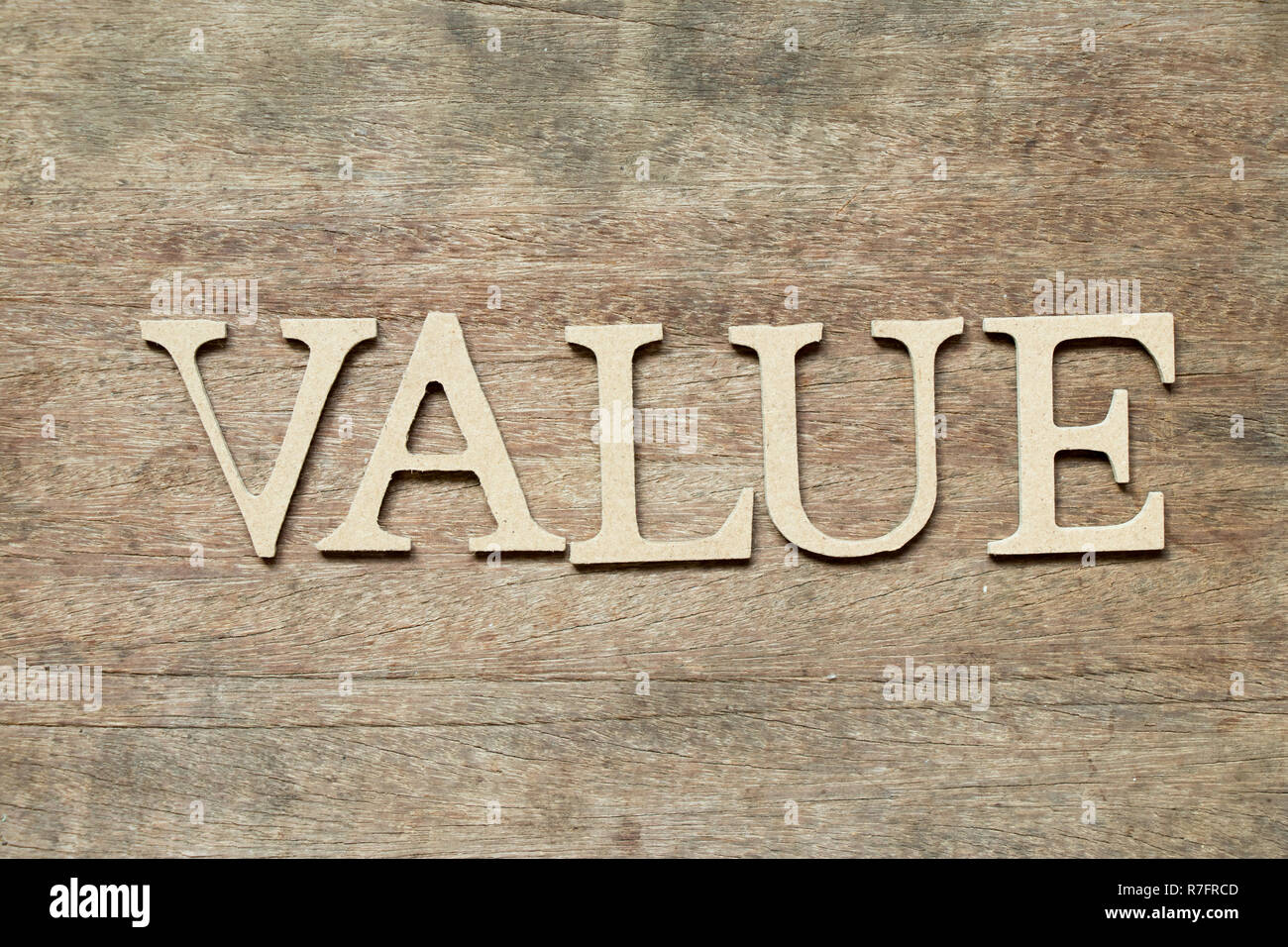 English alphabet in word value on wood background Stock Photo - Alamy