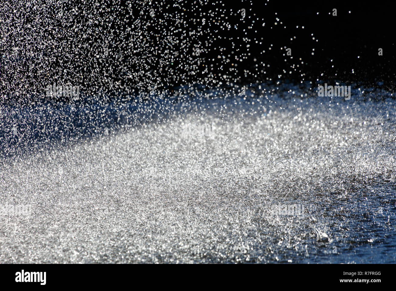 Closeup of water fountain showing falling water droplets Stock Photo ...