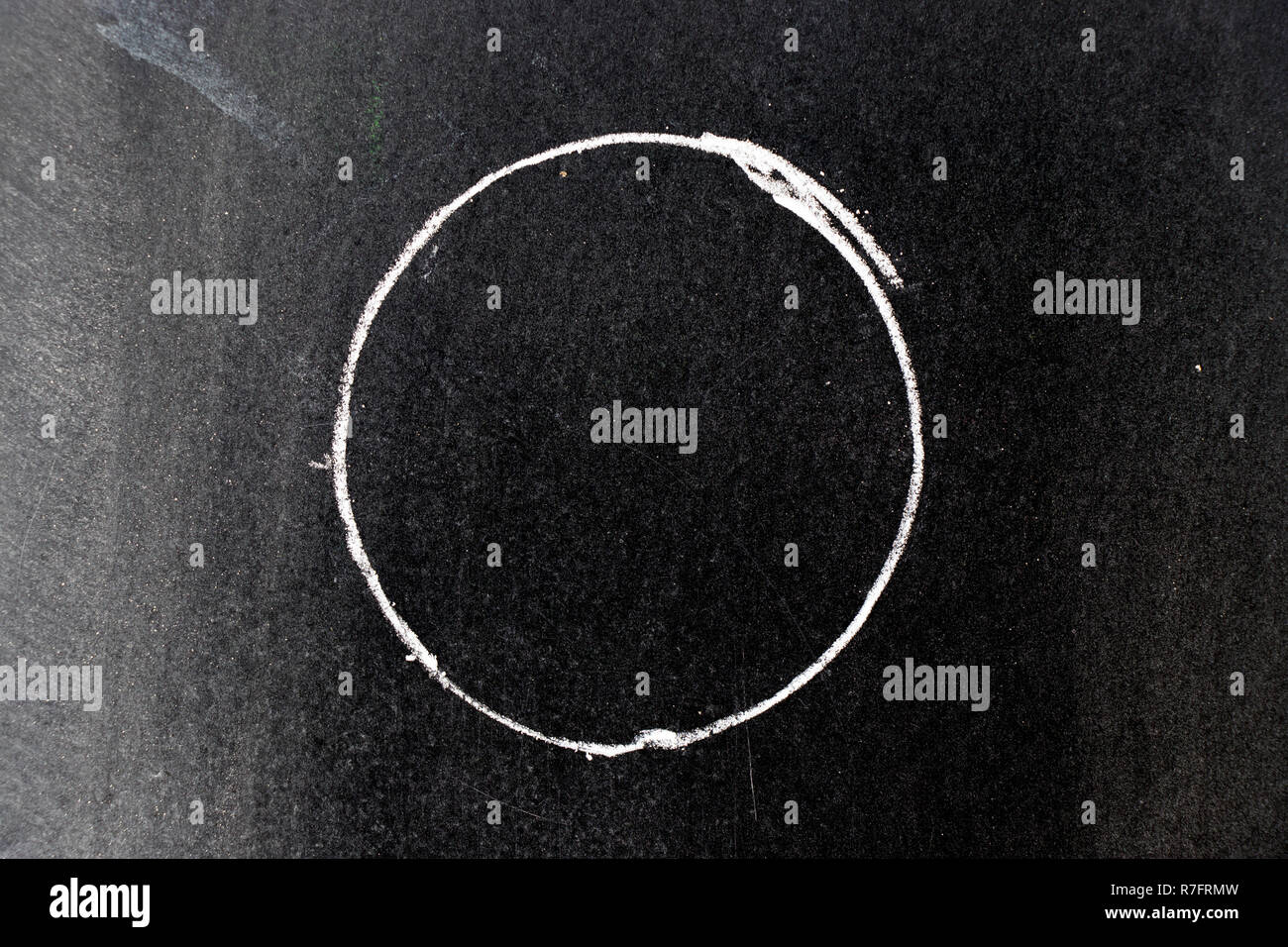 White chalk drawing in circle shape on black board background Stock ...
