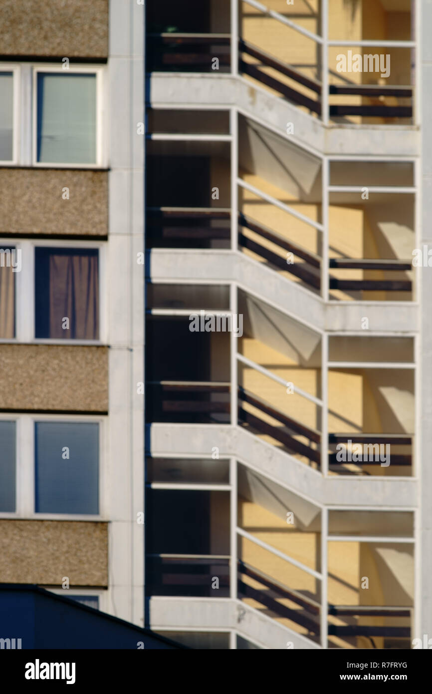 The floors and the staircase of a residential building behind glass ...