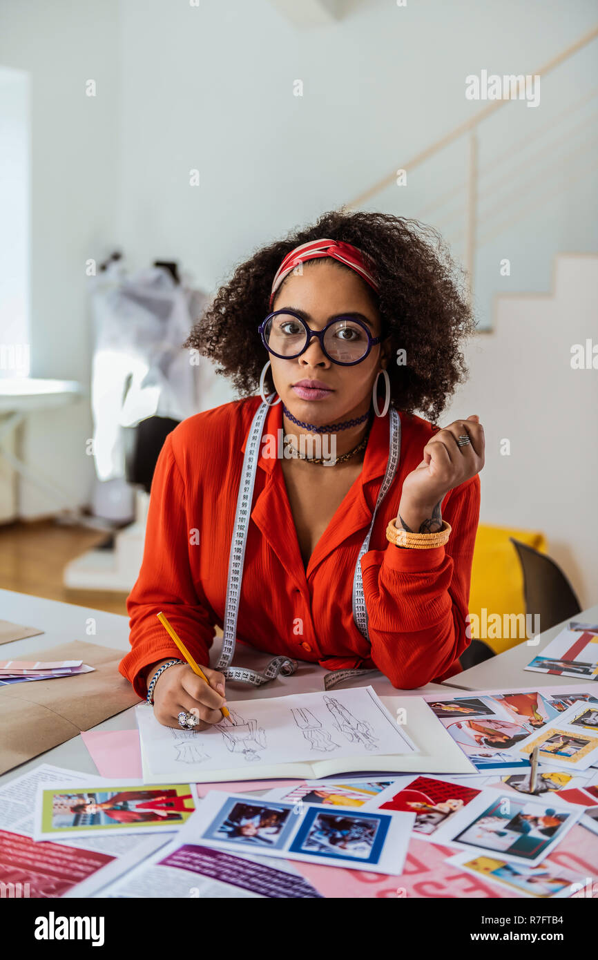 Attractive young female designer spending time in studio Stock Photo ...