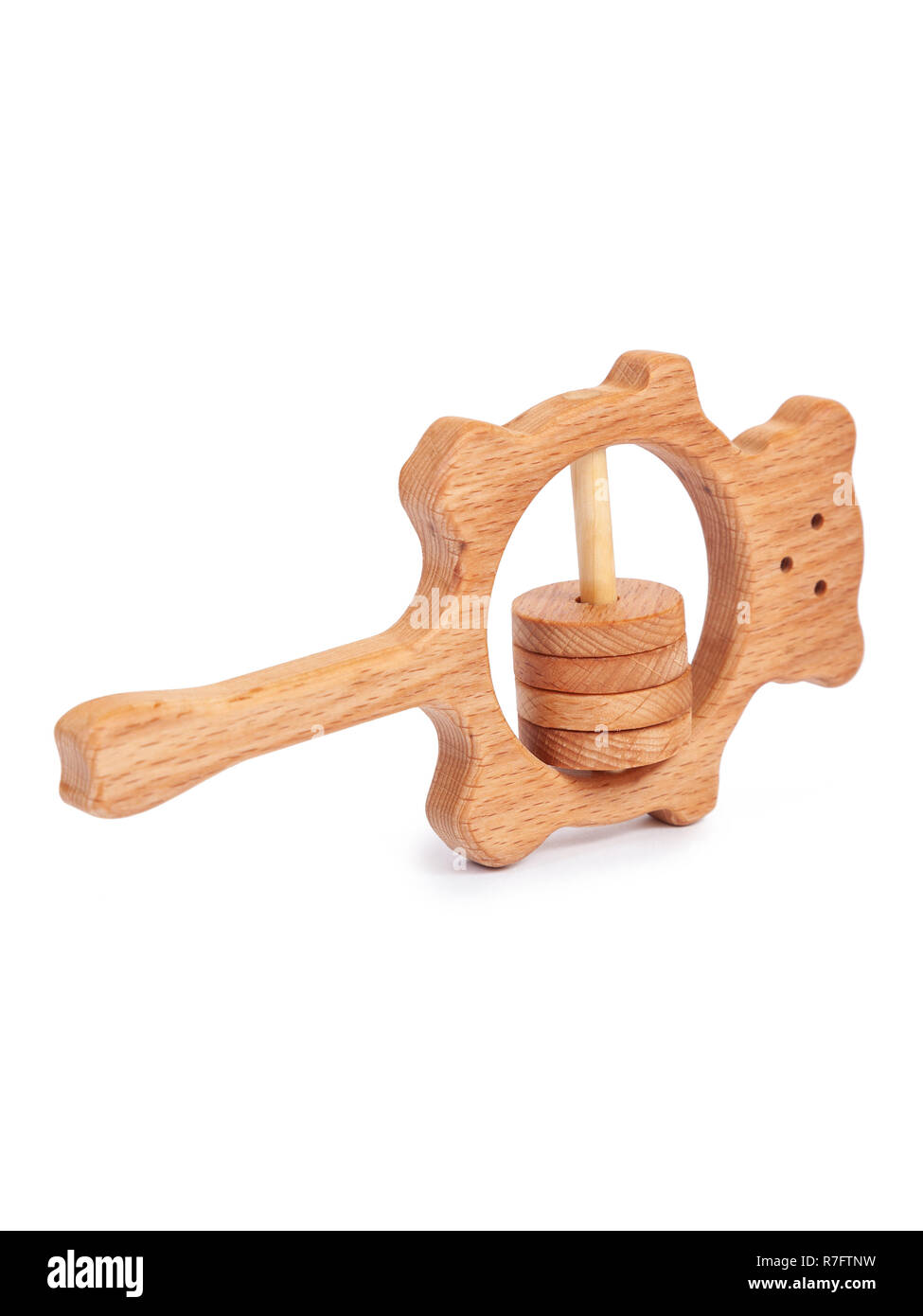 Photo of wooden rattles in the shape of a bear on a white isolated ...