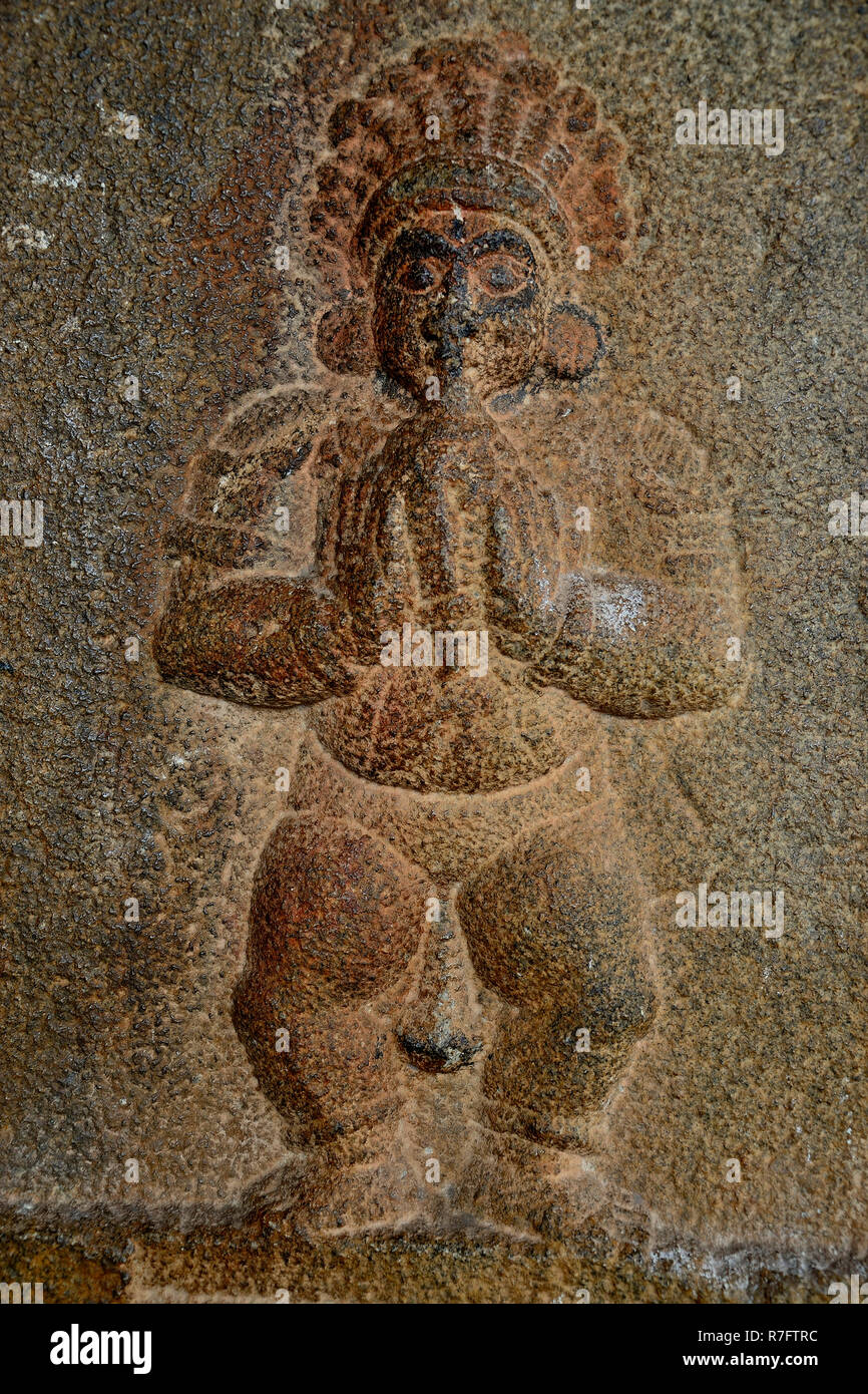 Carved idol on the pillar of an old temple at Hemakuta Hill, Hampi ...
