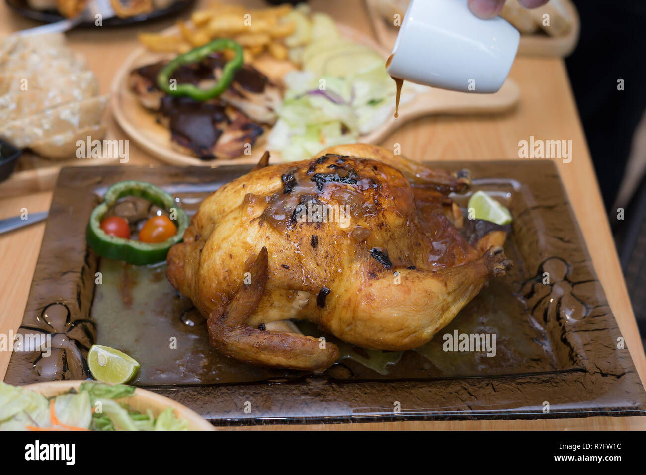 baked whole chicken on a plate. horizontal view from above Stock Photo ...