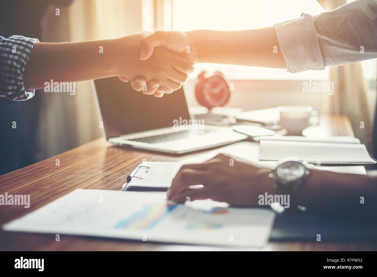 Business People Handshake Greeting Deal at work Stock Photo - Alamy