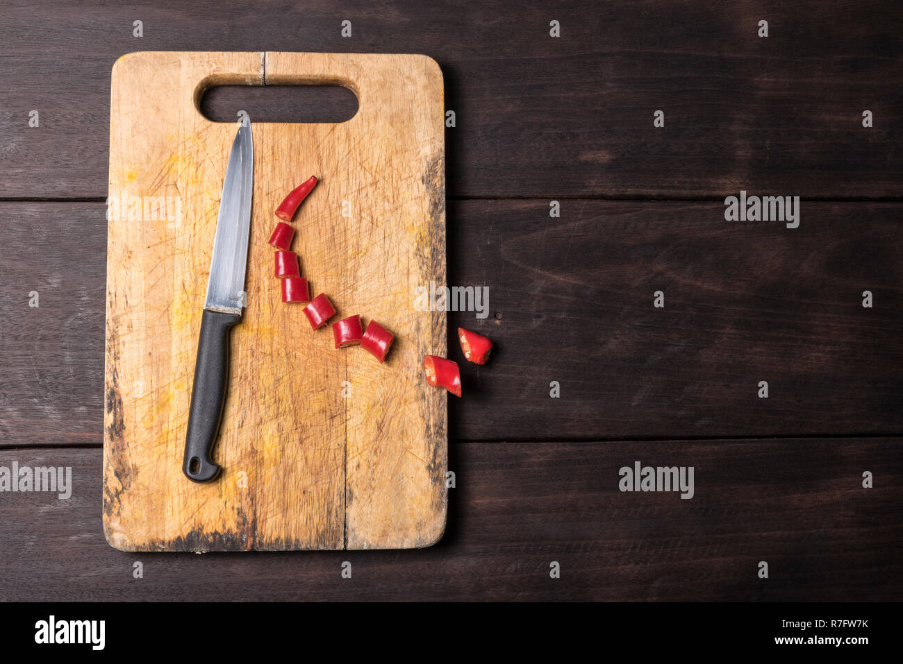 Chilli knife on wooden hi-res stock photography and images - Alamy