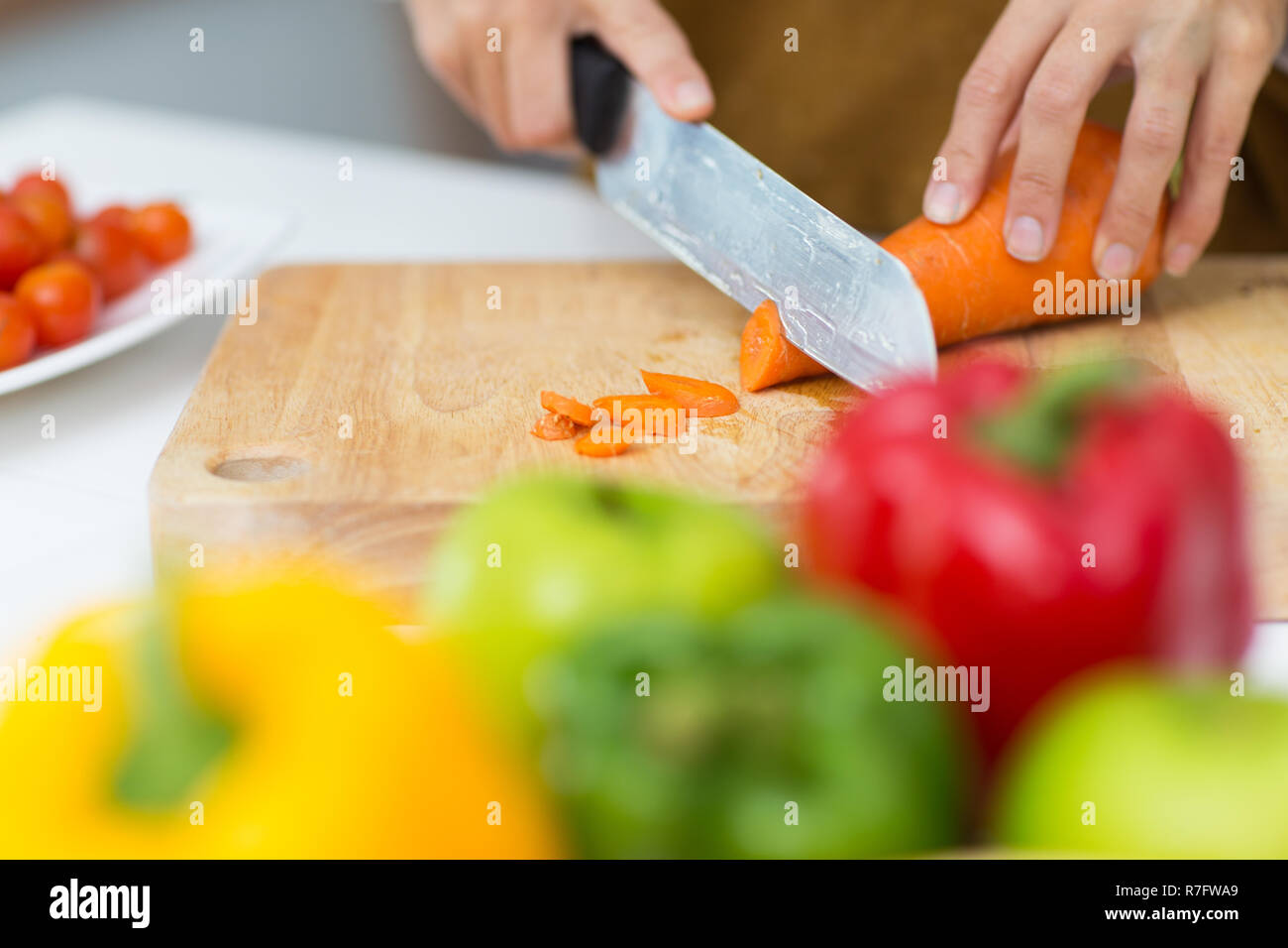 Female hands cutting tomato knife hi-res stock photography and images ...