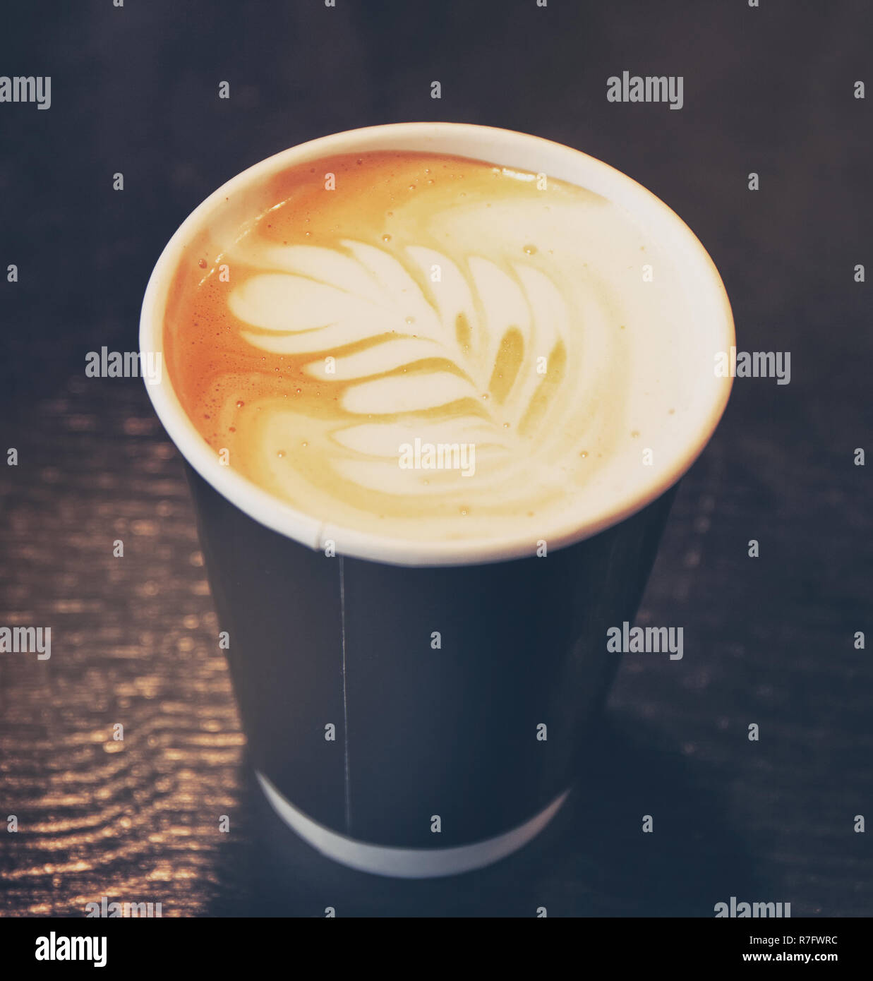 Outdoor street food coffee in paper cup on a wooden table, vintage ...