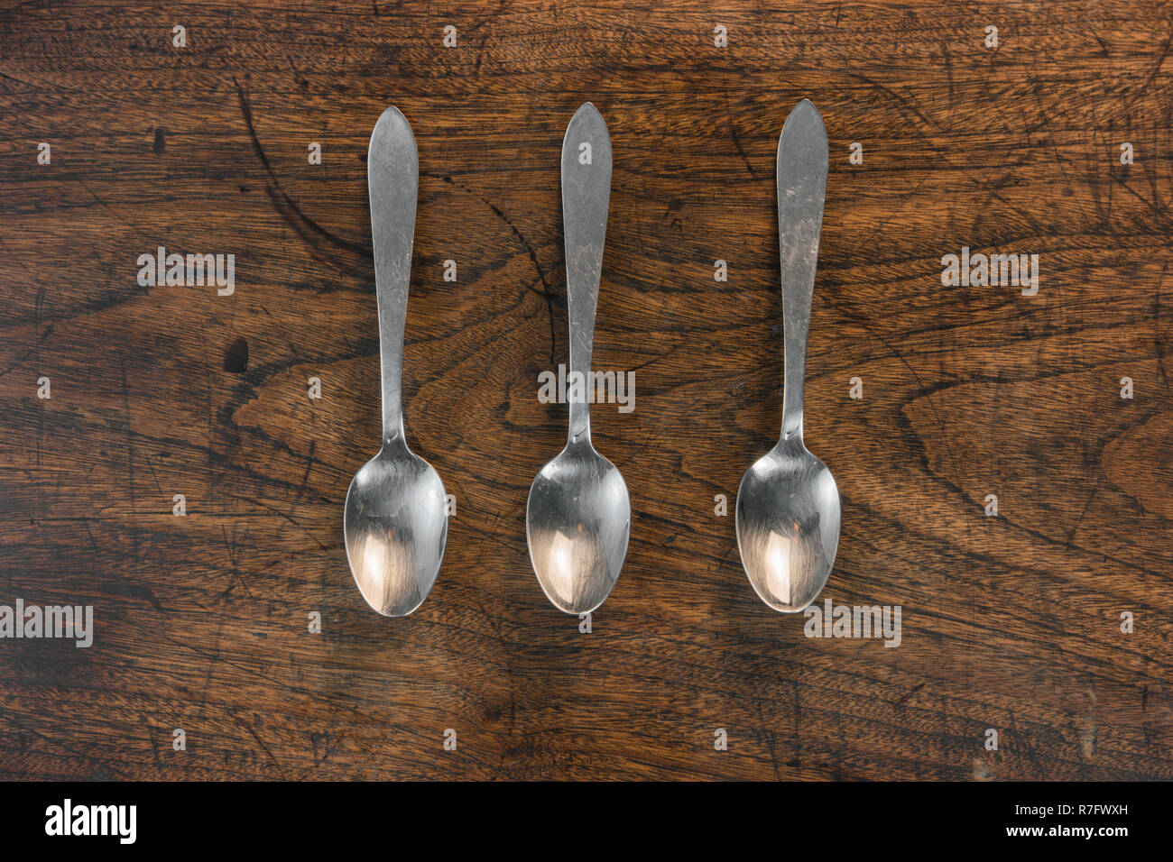 Spoons Top View Isolated on Background. Table Setting Stock Photo - Alamy