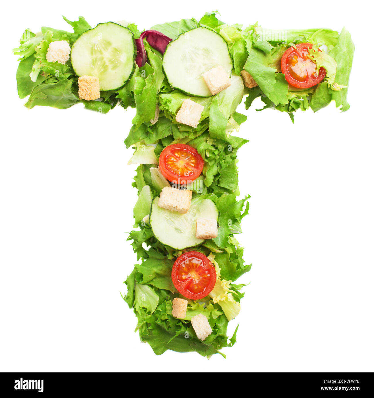 T letter made with salad isolated on white Stock Photo - Alamy