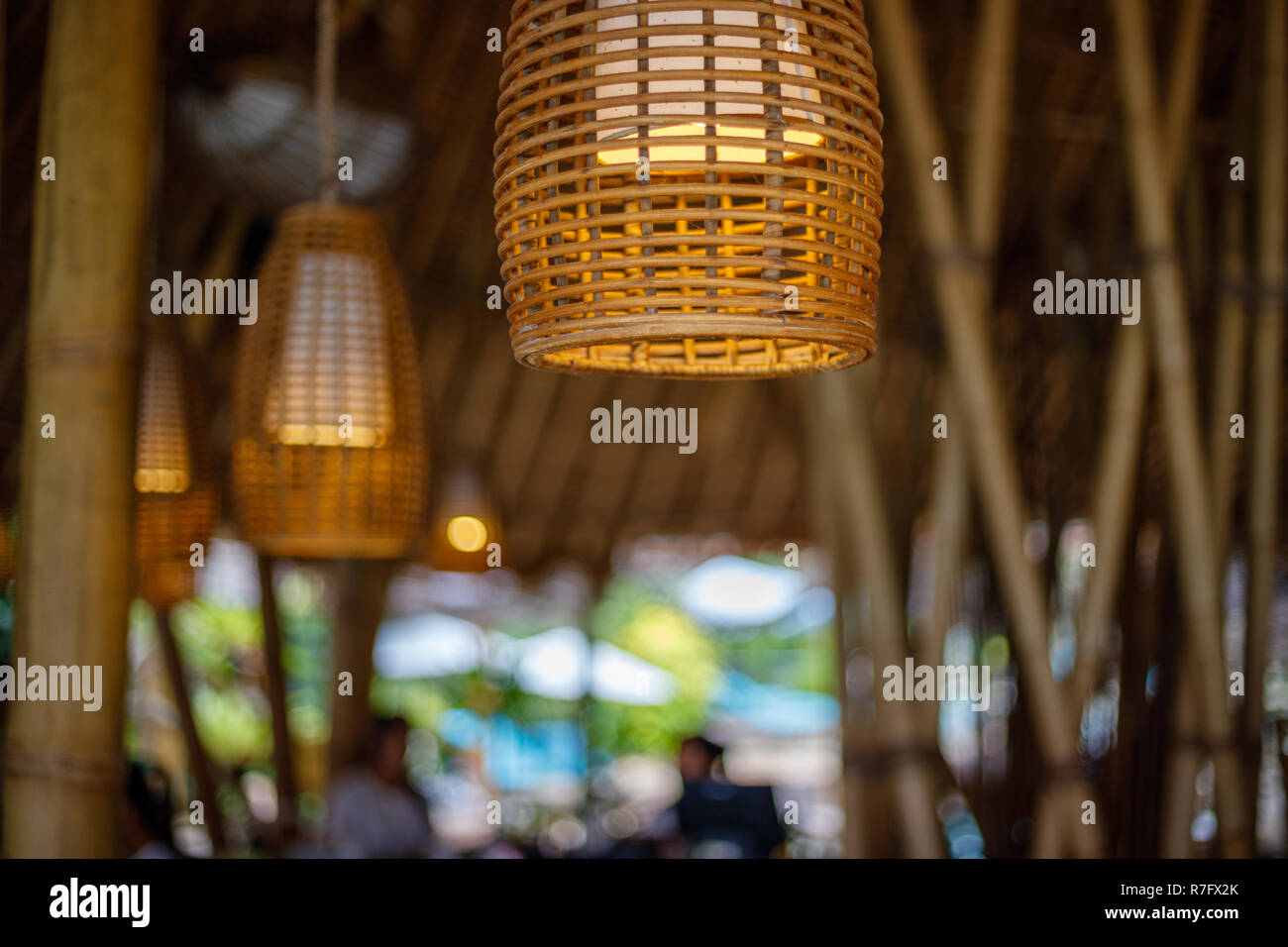 Straw lamps. Restaurant interior. Natural materials. Bali, Indonesia ...
