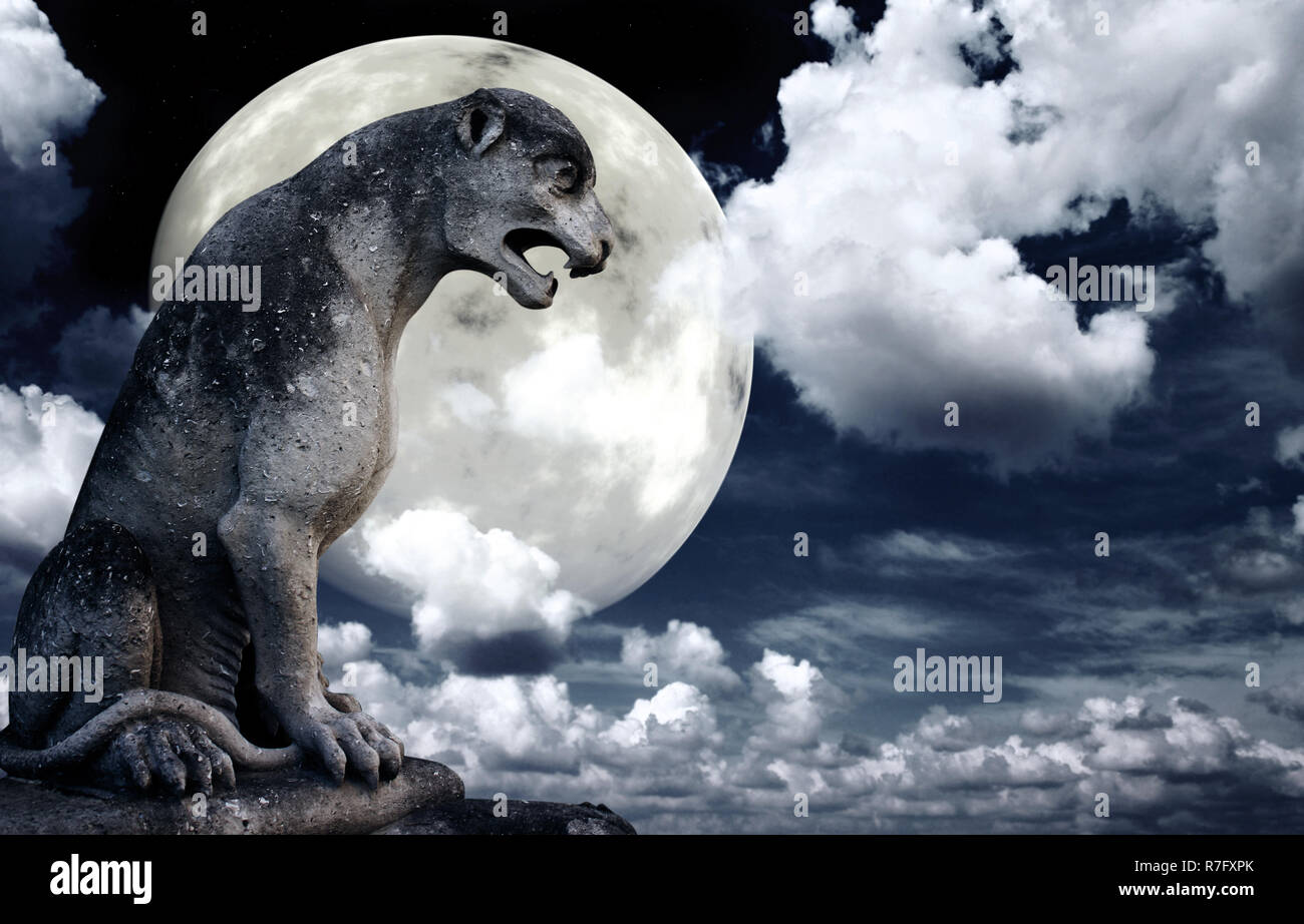 Ancient lion statue and bright moon in the night sky. Elements of this ...