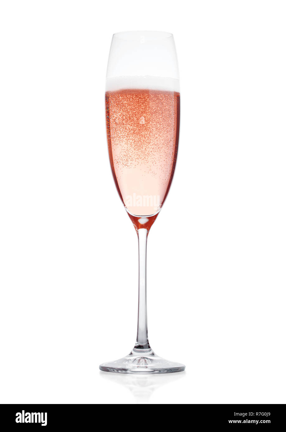 Elegant glass of pink champagne with bubbles on white background with ...