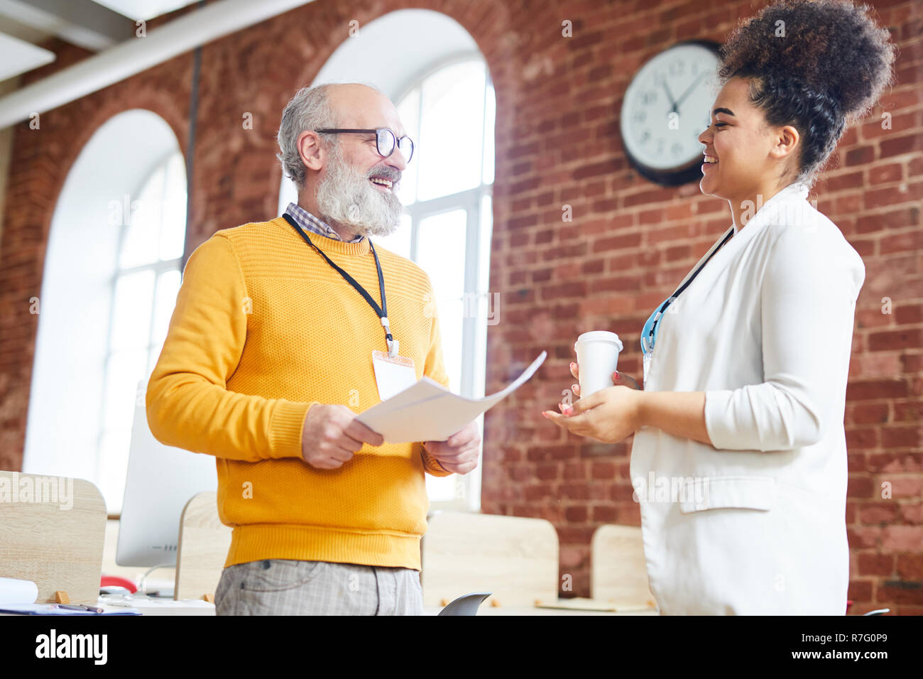 Talk of office workers Stock Photo - Alamy