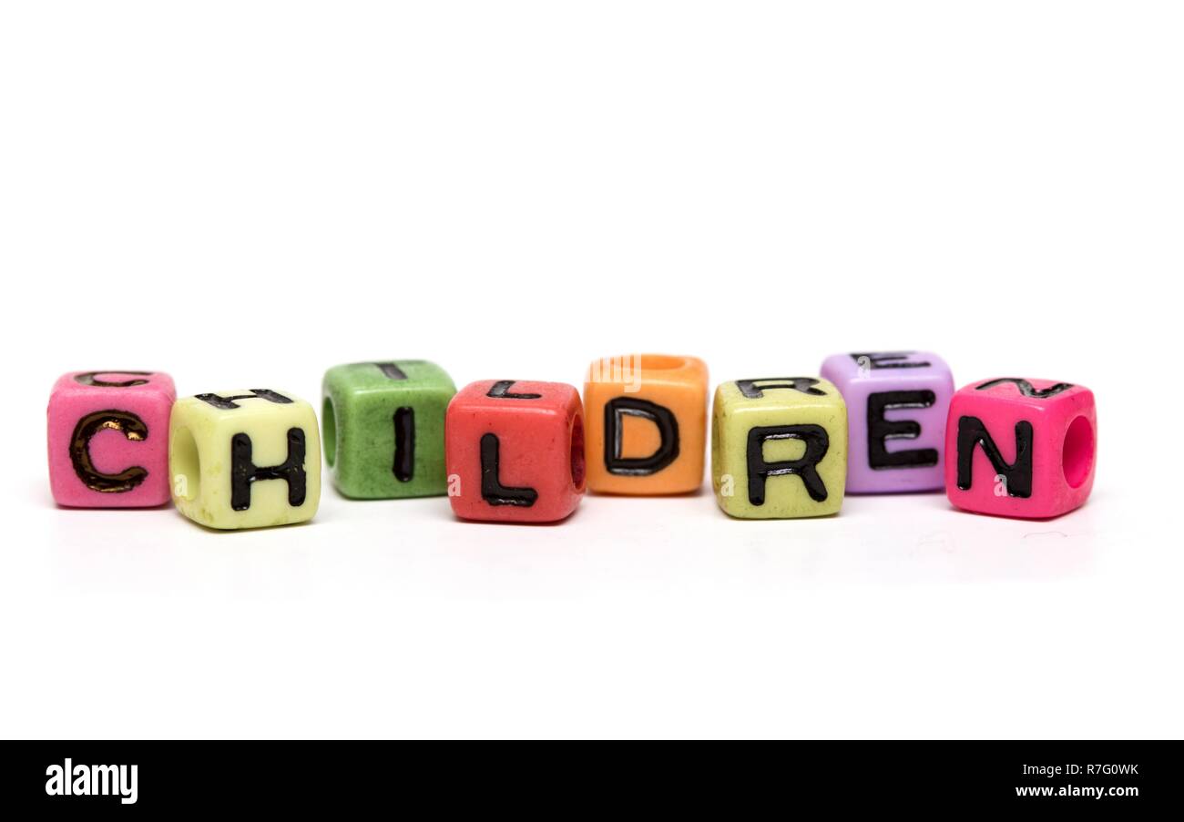 children - word made from multicolored child toy cubes with letters ...