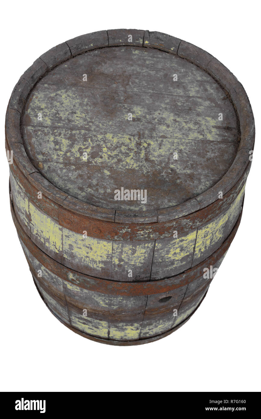 old rusty wooden barrel with remnants of yellow paint isolated on white ...