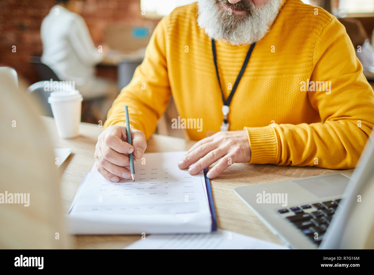 Checking banker hi-res stock photography and images - Alamy