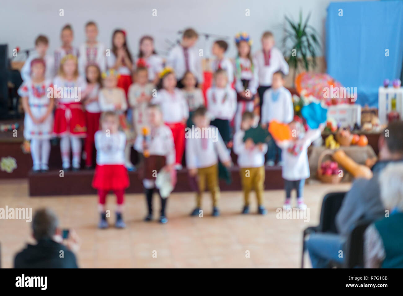 children perform at concert in primary school. Children's theatrical ...