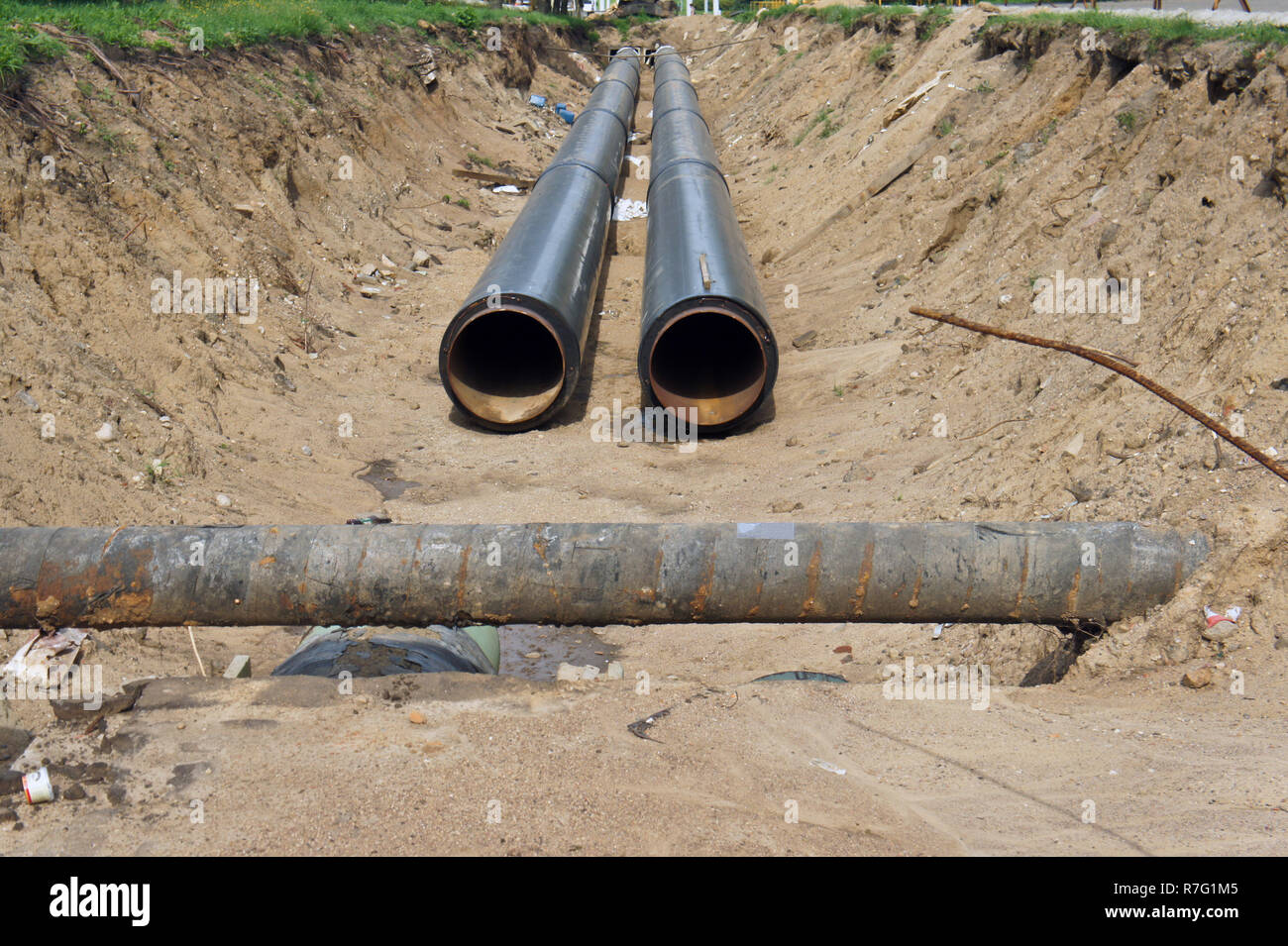 Construction work. Pipe laying. Repair of communications Stock Photo ...