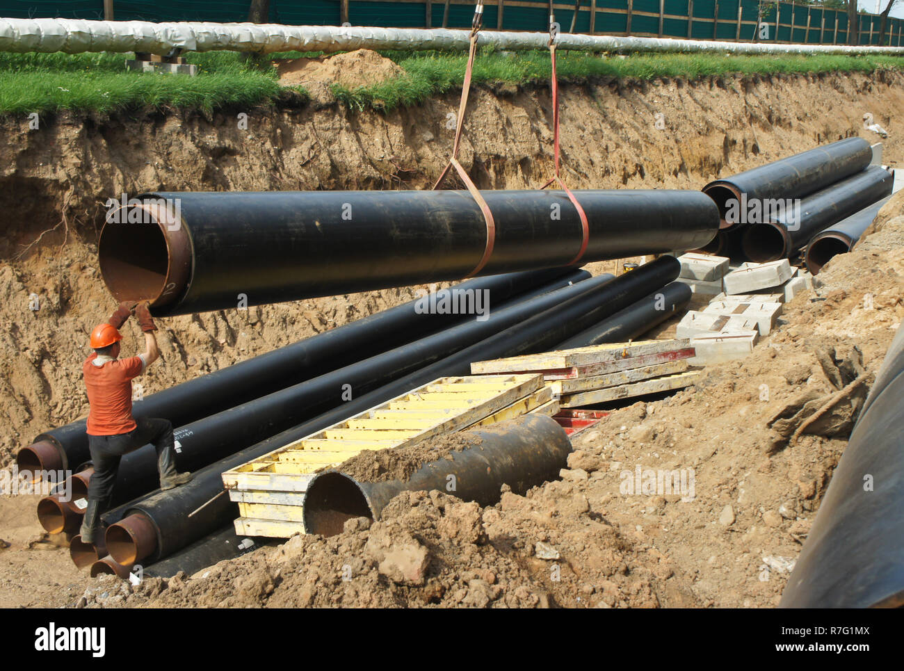 Construction work. Pipe laying. Repair of communications Stock Photo ...