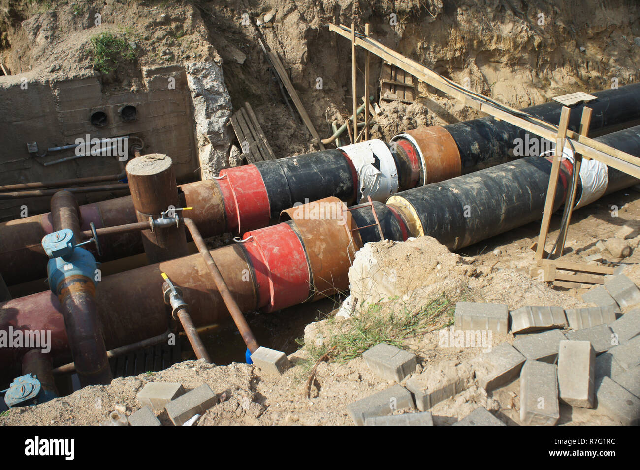 Construction work. Pipe laying. Repair of communications Stock Photo ...