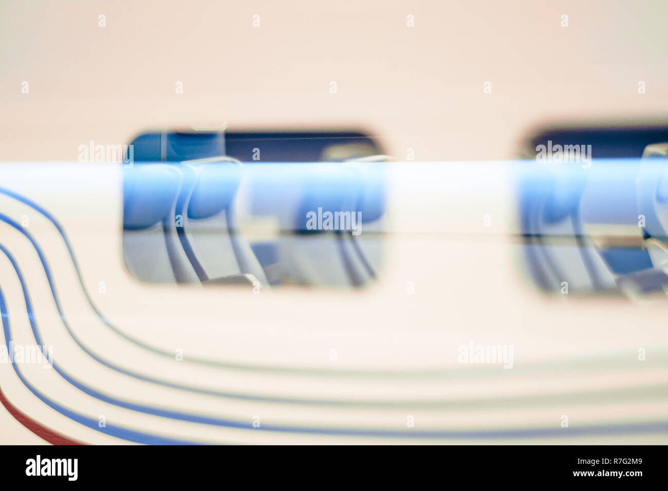 Miniature toy model of modern train crossing bridge Stock Photo - Alamy