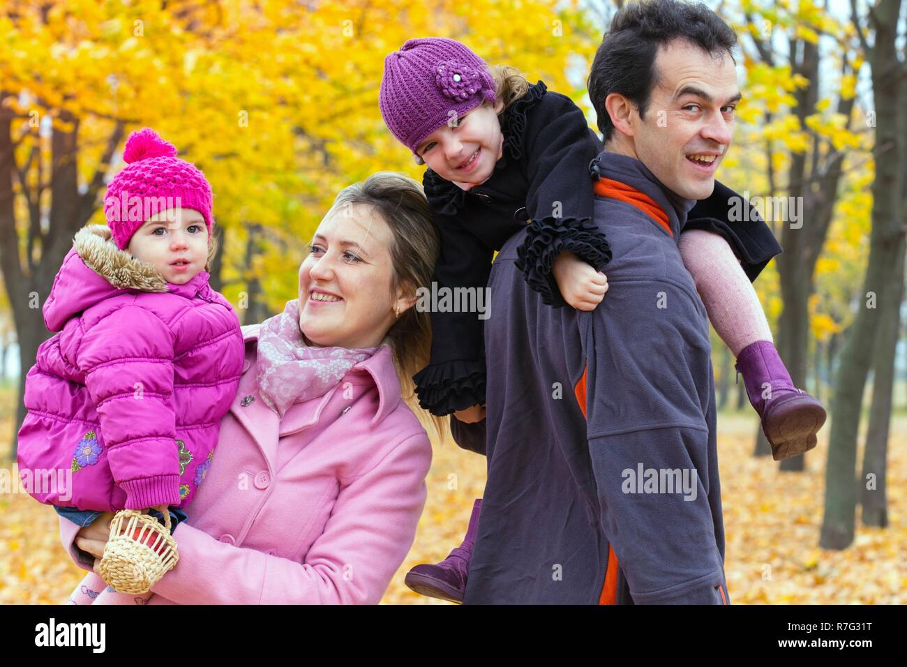 happy family with smiling faces outdoors Stock Photo - Alamy