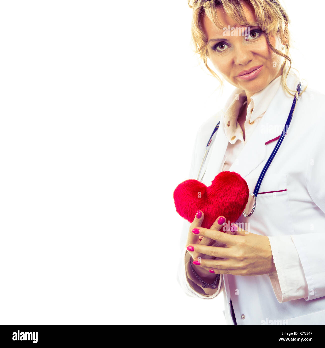 Periodic examinations. Cardiology concept. Female cardiologist holding ...