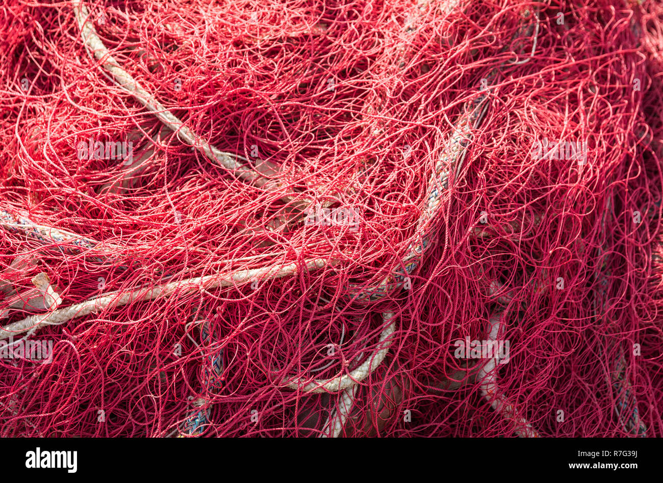 red fishing nets. Close up view of fishing net Stock Photo - Alamy
