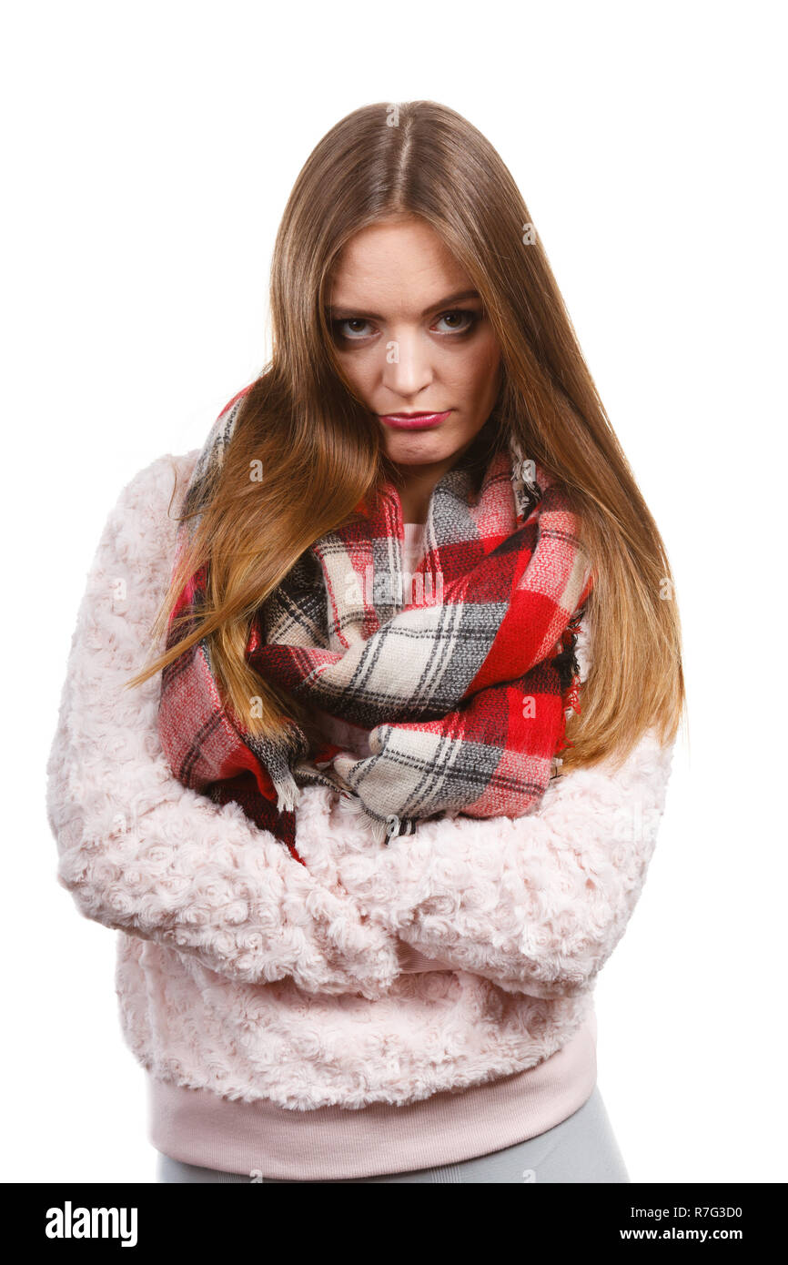 Fashion, clothes and clothing concept. Grumpy woman feeling cold ...