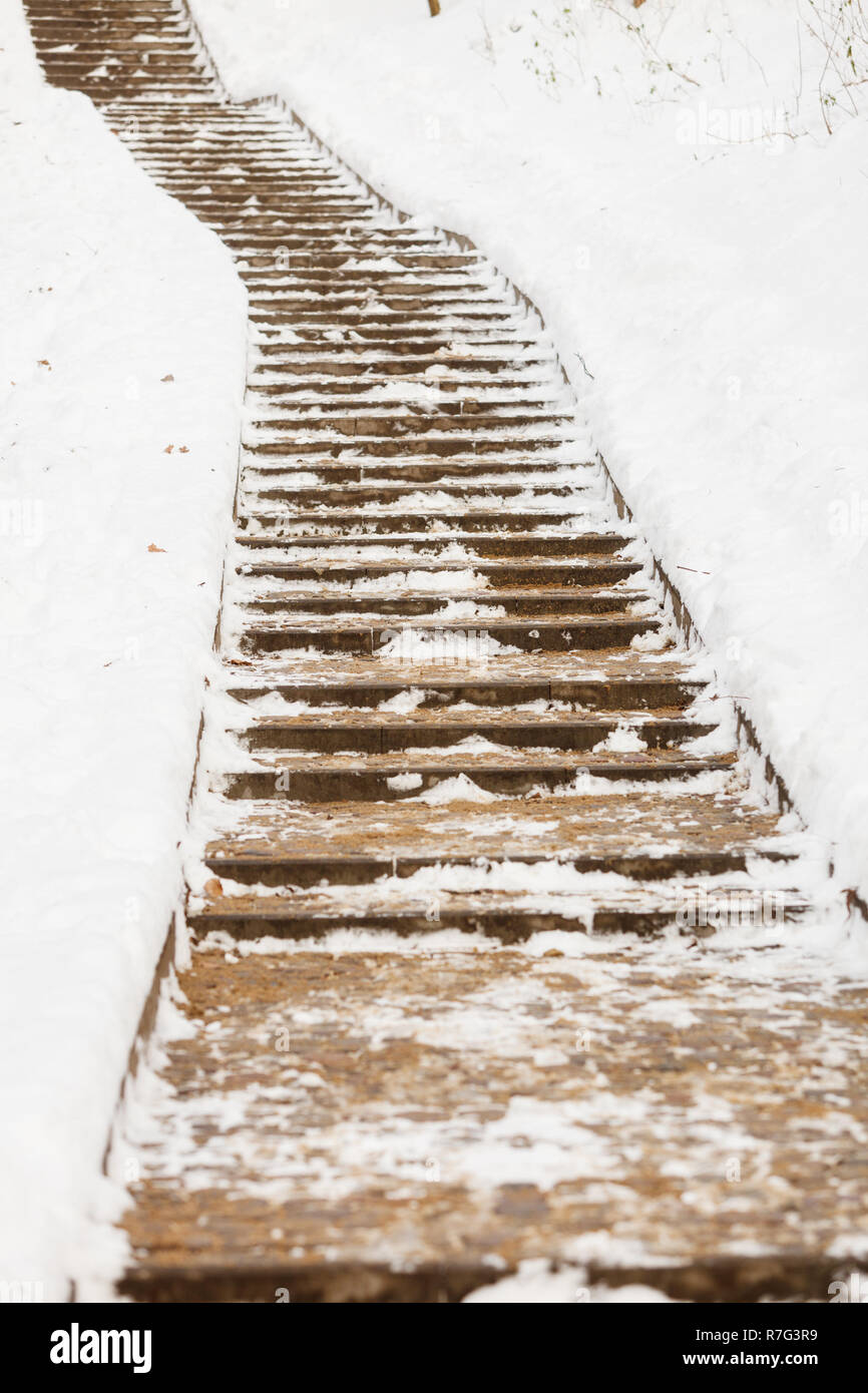 Empty path in the snow. Park stairway during winter. Outdoor ...