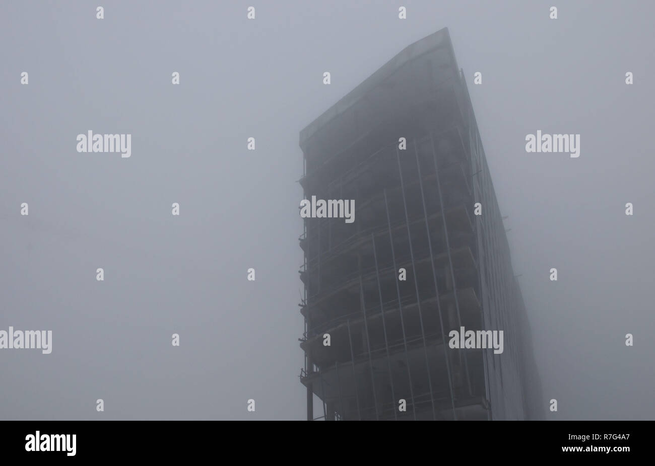 Building object in a thick mystical fog Stock Photo - Alamy