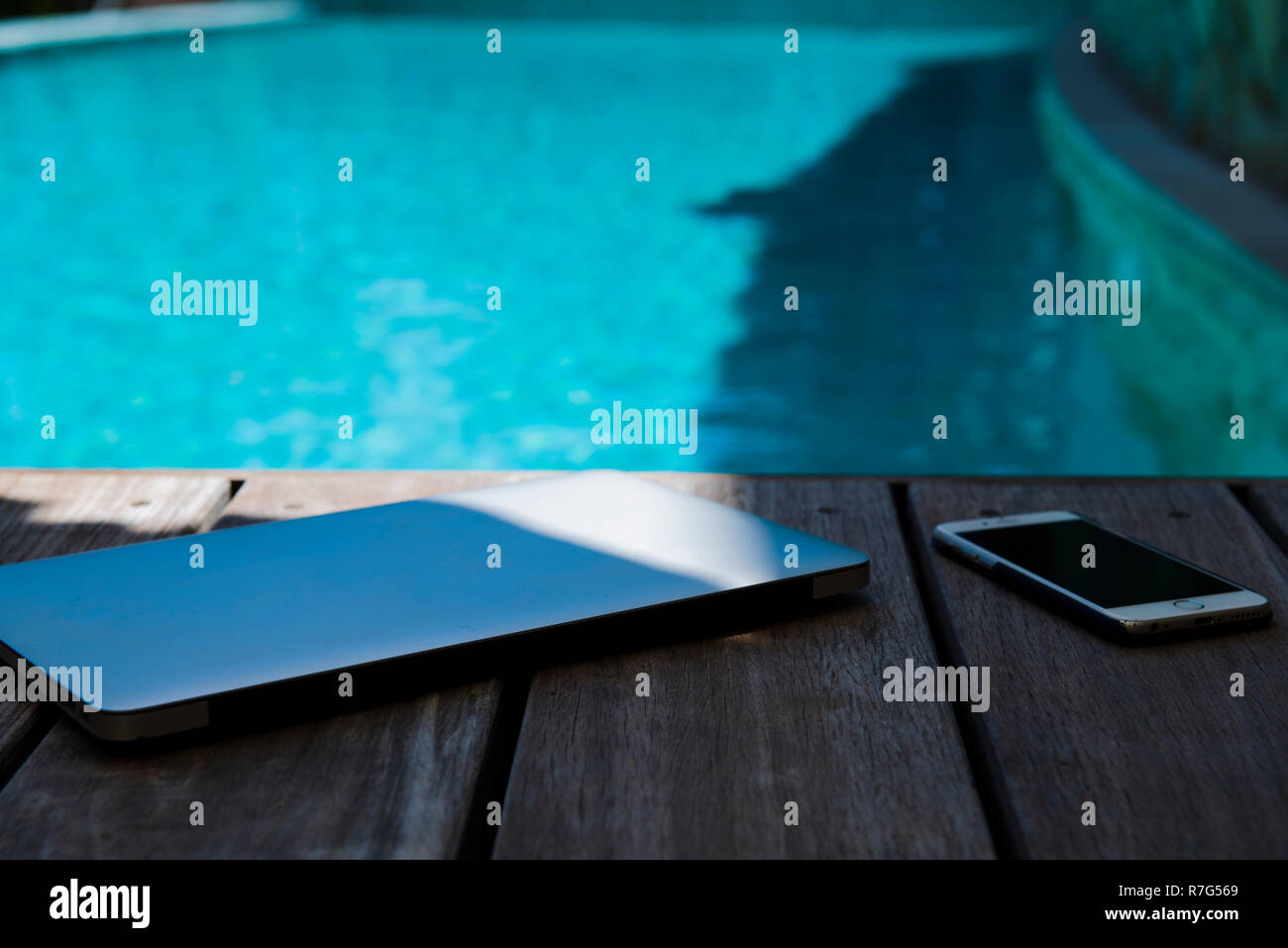 Working at the pool - Office Stock Photo - Alamy