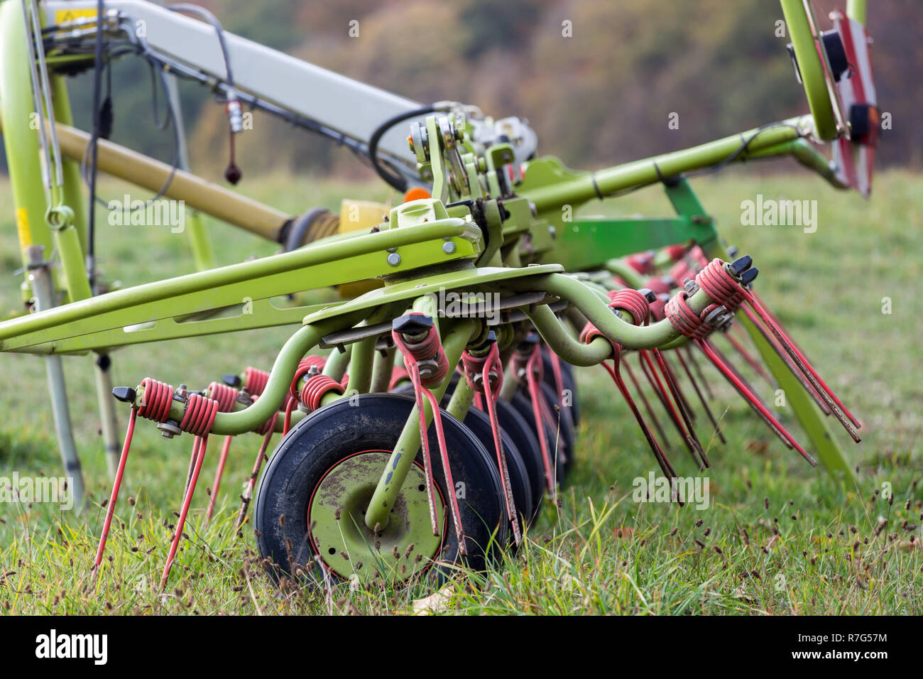 farming rotary tedder on a meadow Stock Photo - Alamy