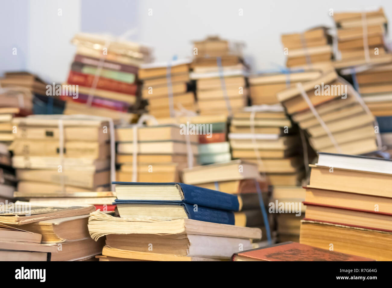 many old books stacked Stock Photo - Alamy