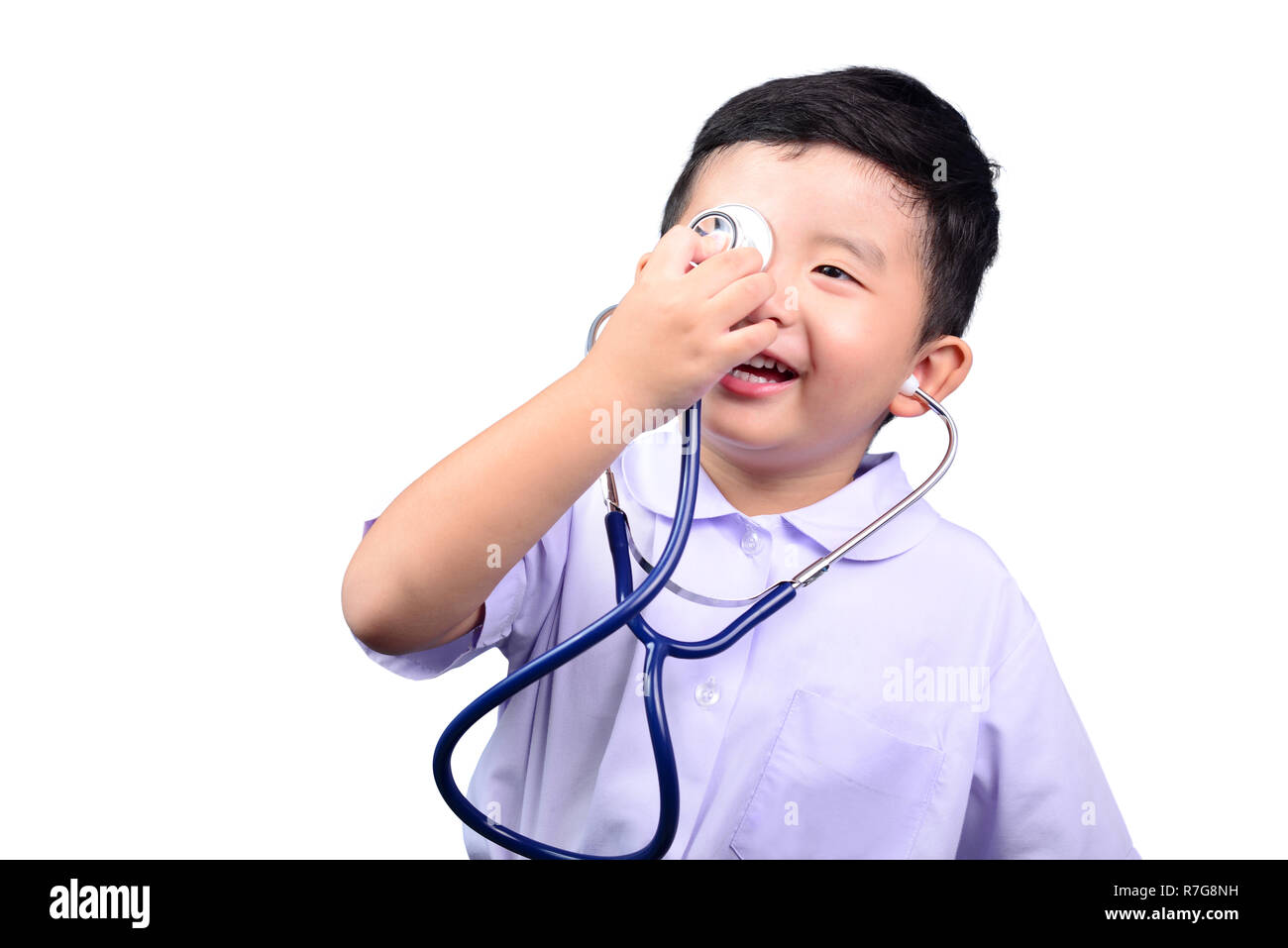 Asian Thai kindergarten student kid in school uniform playing medical ...