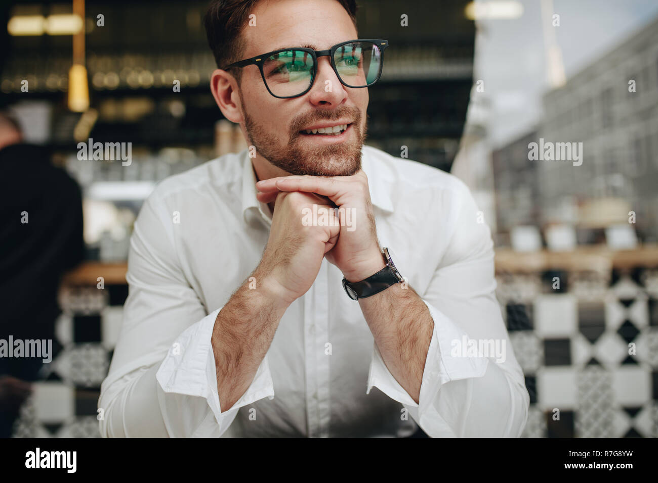 Resting chin on hands hi-res stock photography and images - Alamy