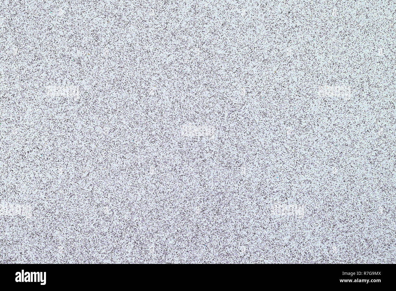Snow white colored sand paper textured background with sparkles and ...