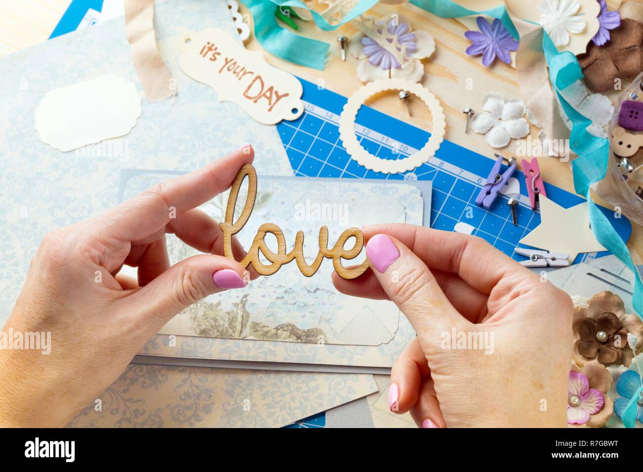scrapbook background. Hands, Card and tools with decoration Stock Photo ...