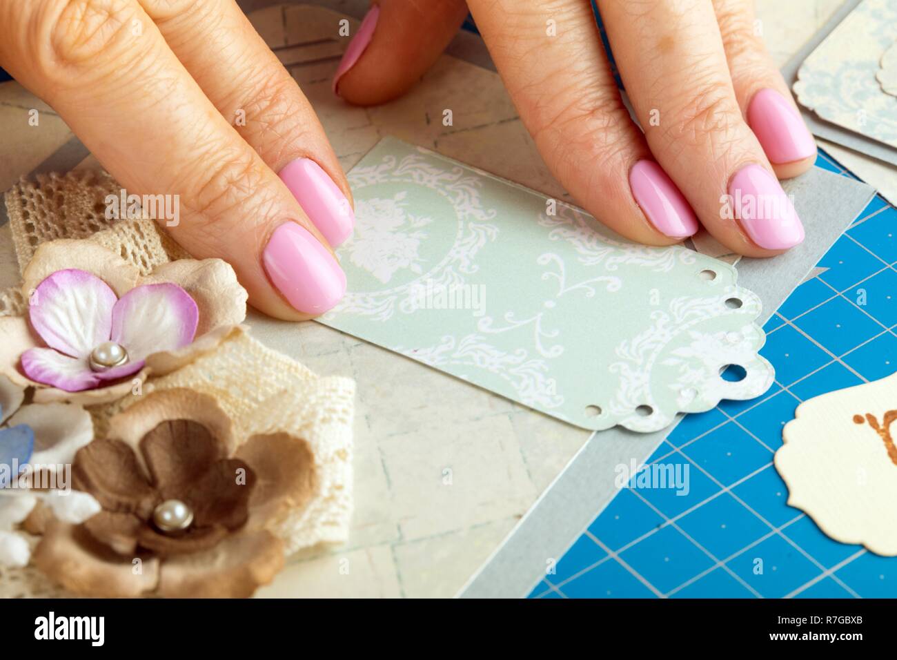 scrapbook background. Hands, Card and tools with decoration Stock Photo ...