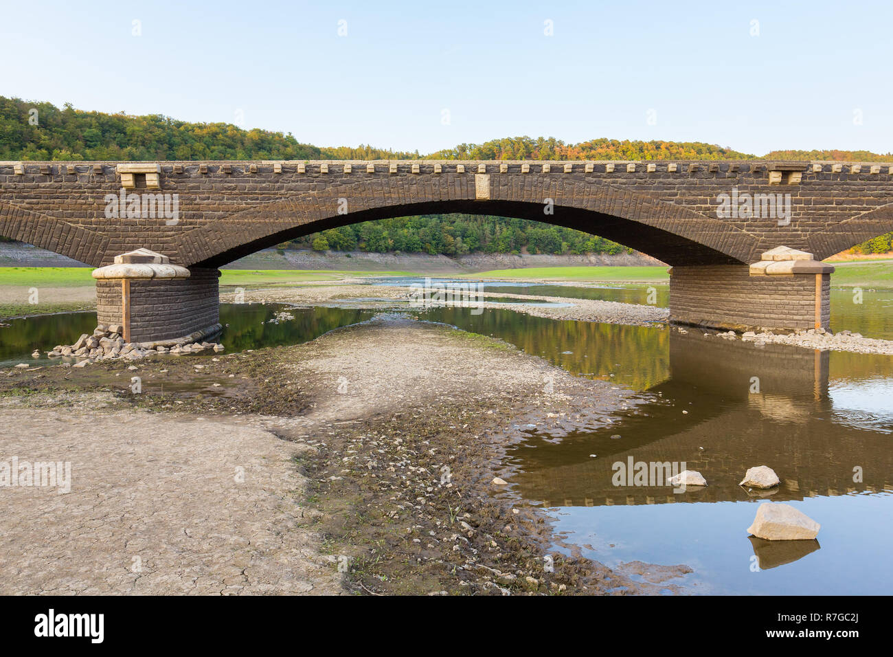 Stone arch bridge in dry german Edersee in Sauerland area Stock Photo ...
